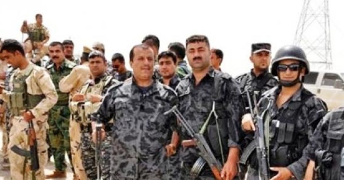 ISIS parades Kurdish peshmerga soldiers in cages