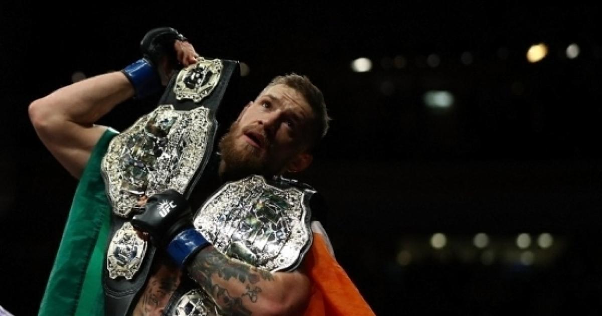 Conor McGregor makes history to become the first UFC duel-weight World ...