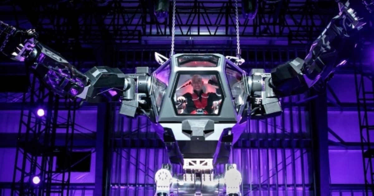 Jeff Bezos tries out robot suit and looks like Iron Man.