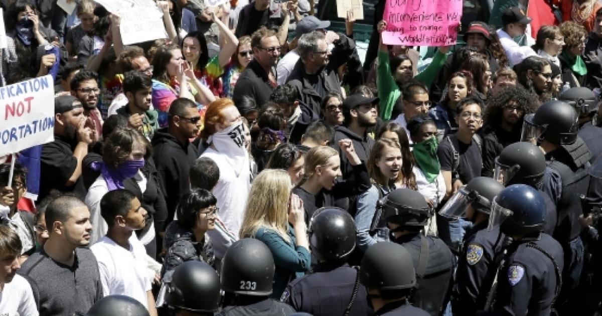 Scores injured as protestors clash over Trump in California