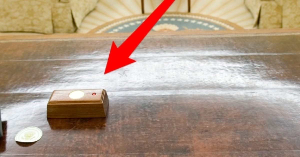 President Donald Trump uses red button on desk to request a special item