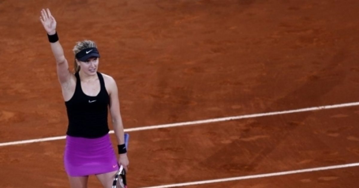 Bouchard breaks through the pain barrier to book 2nd round spot in ...