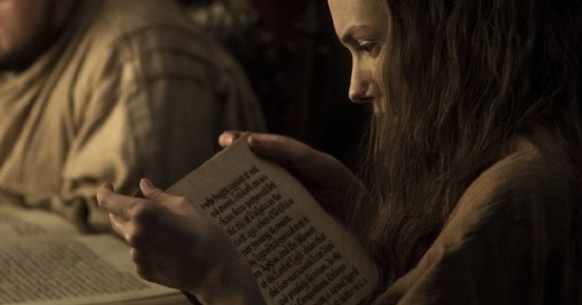 Gilly is reading about Azor Ahai in this picture, here's what the text says