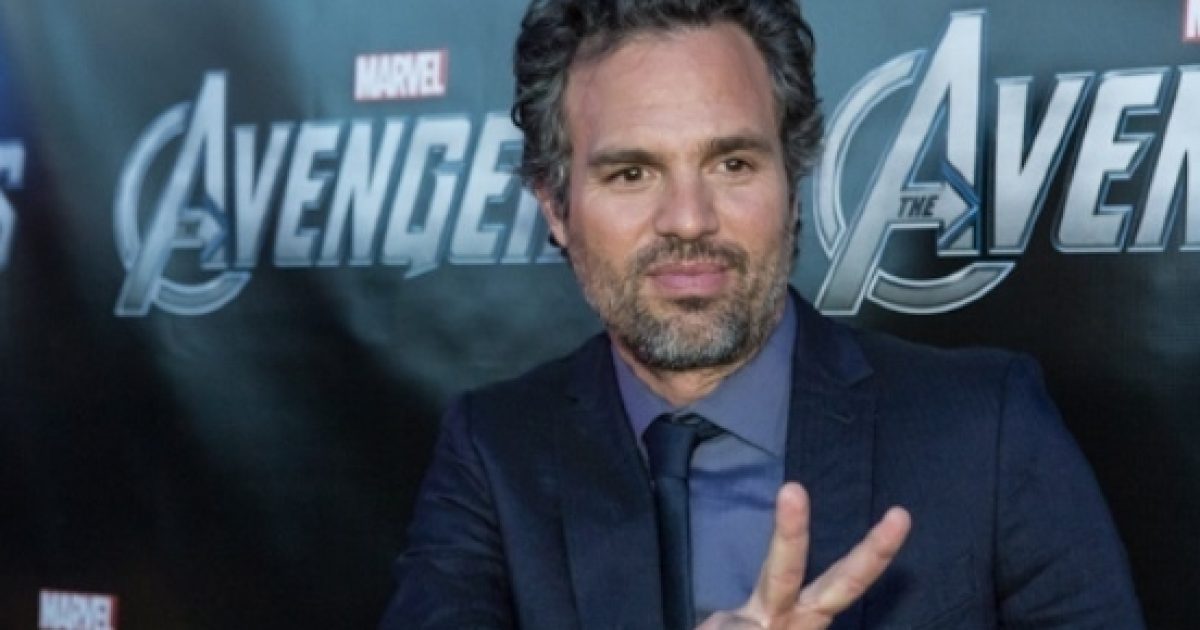 Mark Ruffalo and Michael Moore protests with others in front of Trump Tower