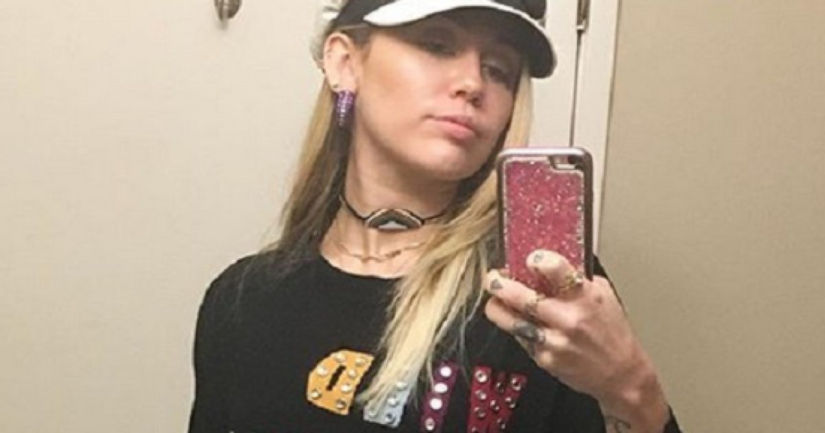 Miley Cyrus sizzles in red bikini from vacation in Byron Bay