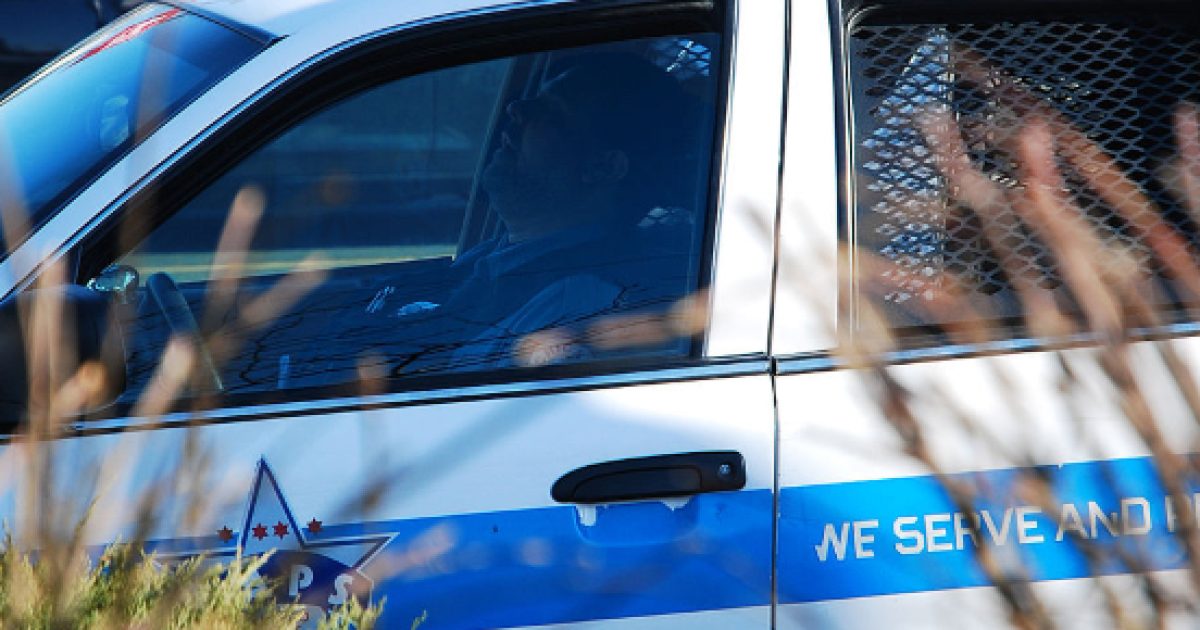 Sleeping Beauty Cop: On-duty officer naps outside massacred school