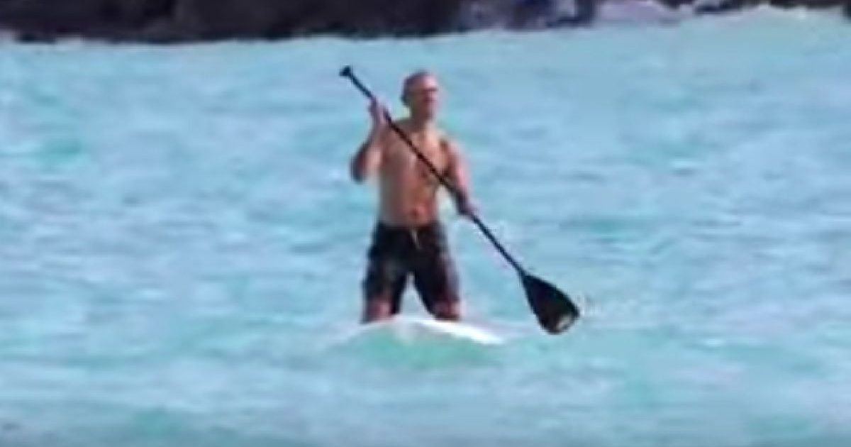 Barack Obama paddleboards in Hawaii while Donald Trump orders airstrike ...